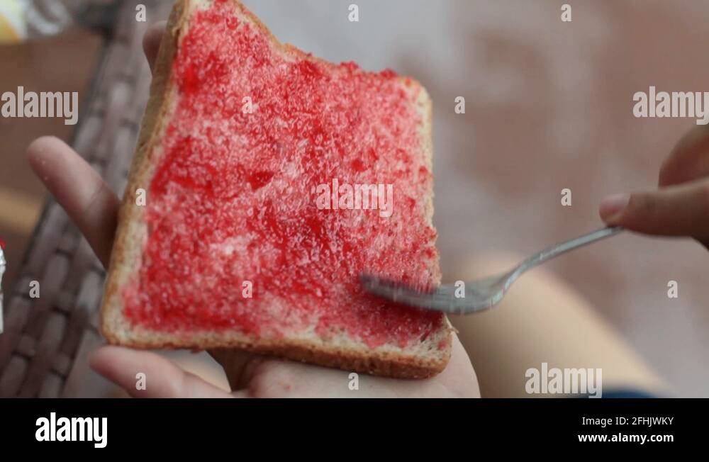 Spreading jam on a slice of bread Stock Videos & Footage - HD and 4K ...