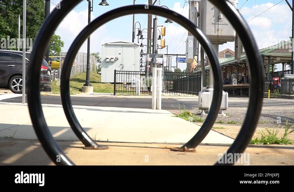 circle bike rack next to train station and intersection with zoom and ...