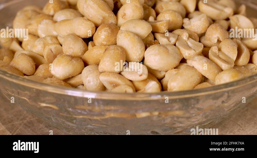Salty groundnuts Stock Videos & Footage - HD and 4K Video Clips - Alamy