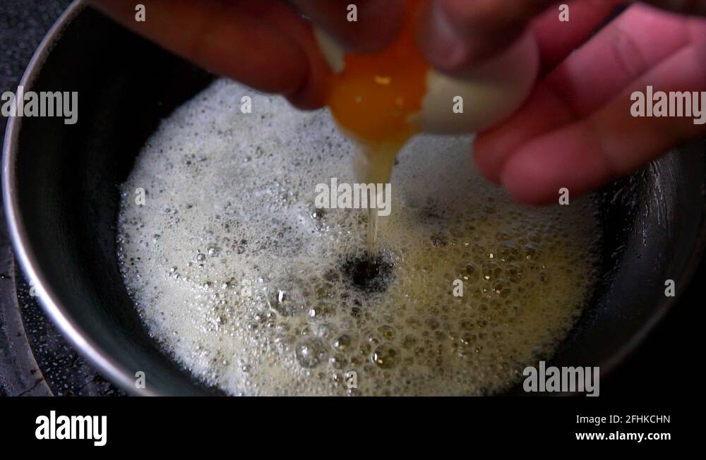 Cracked open egg Stock Videos & Footage - HD and 4K Video Clips - Alamy