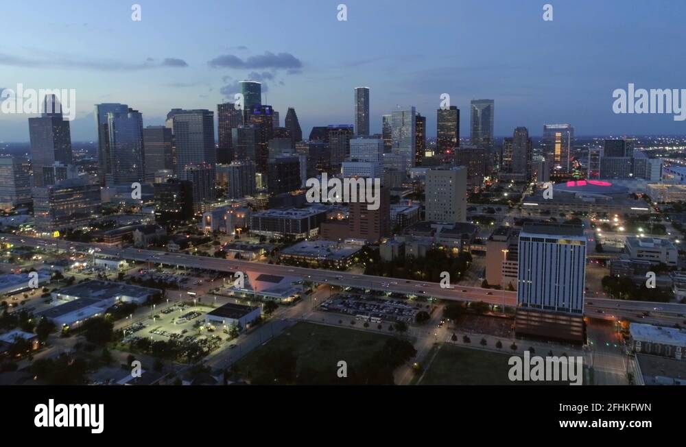 This video is of an aerial view of downtown Houston skyline at night ...