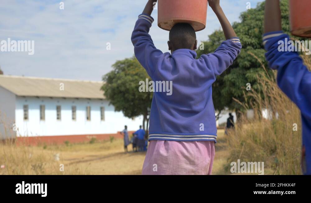 Children carry water buckets Stock Videos & Footage - HD and 4K Video ...
