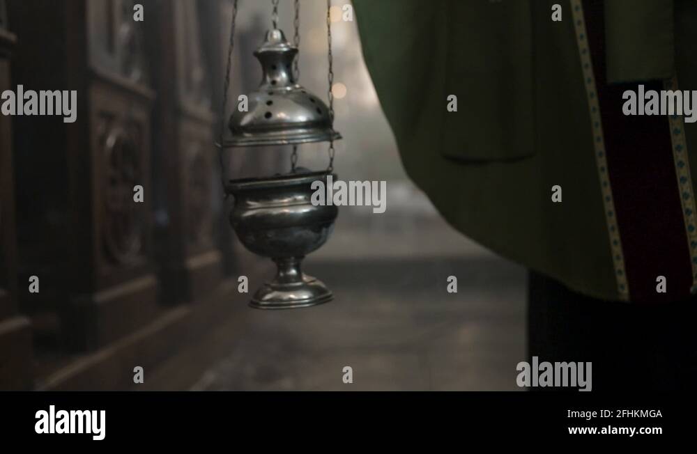 Priest and smoking thurible in a church Stock Video Footage - Alamy