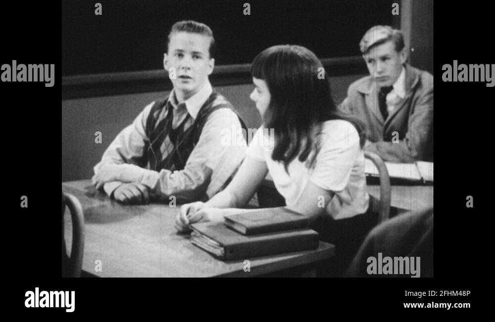 1940s: Classroom. Students and teacher speak Stock Video Footage - Alamy