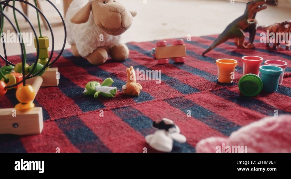 Kids toys on floor Stock Videos & Footage - HD and 4K Video Clips - Alamy