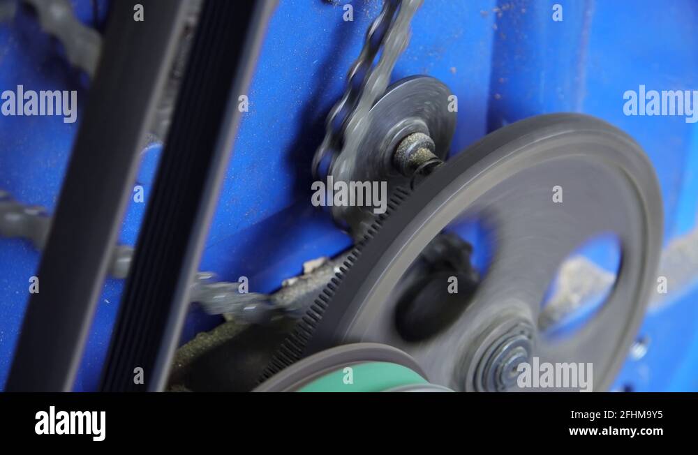 Machine gears chain belt transmission, sprocket cogwheeling in a tandem ...