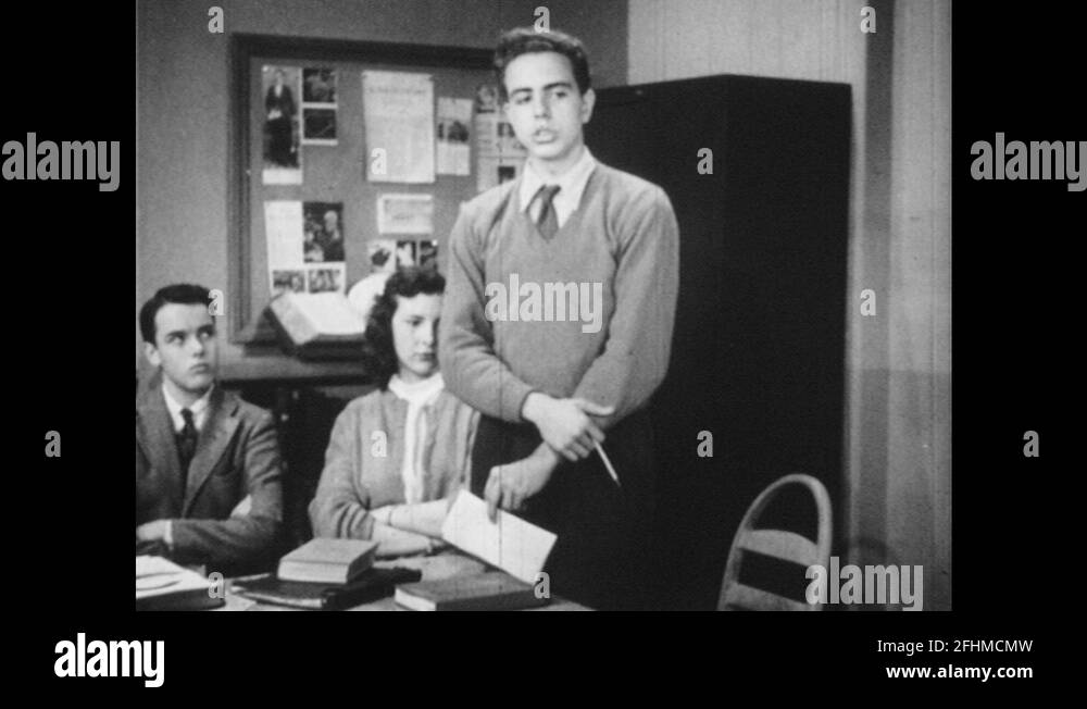 1940s: Classroom. Students stand and speak. Teacher Stock Video Footage ...