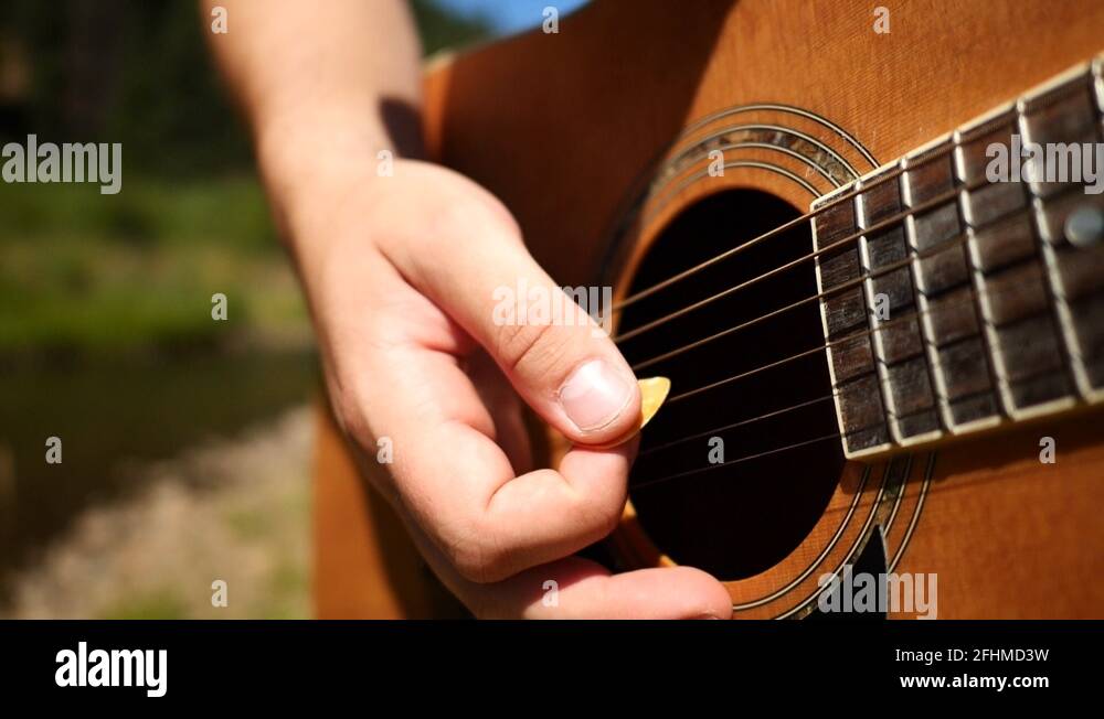 Guitar strumming Stock Videos & Footage - HD and 4K Video Clips - Alamy