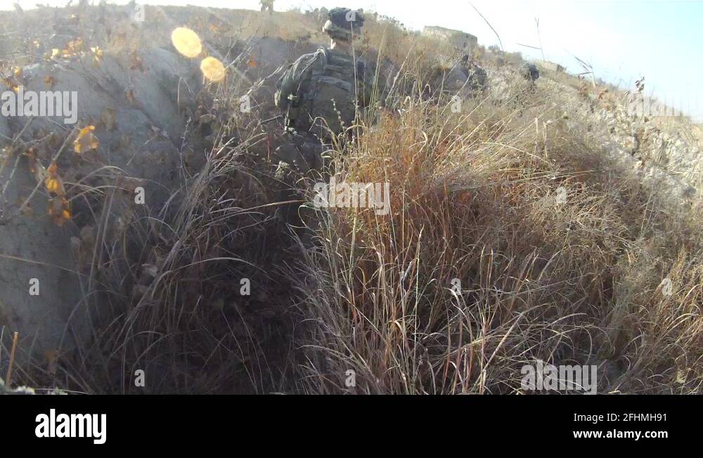 Hemet camera of US Army 2nd Infantry Division soldiers patrolling ...