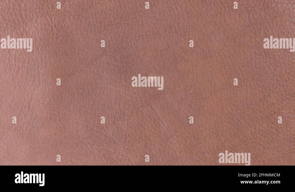 Rotation of natural shiny leather. Brown skin texture Stock Video ...