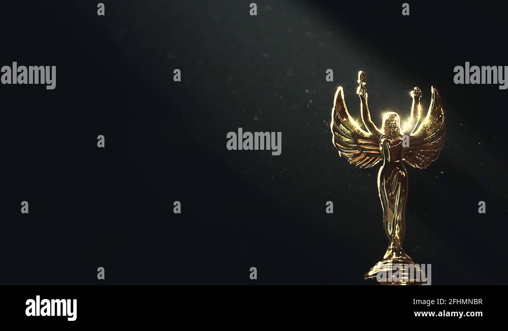 Gold Woman Statue dark background Stock Video Footage - Alamy
