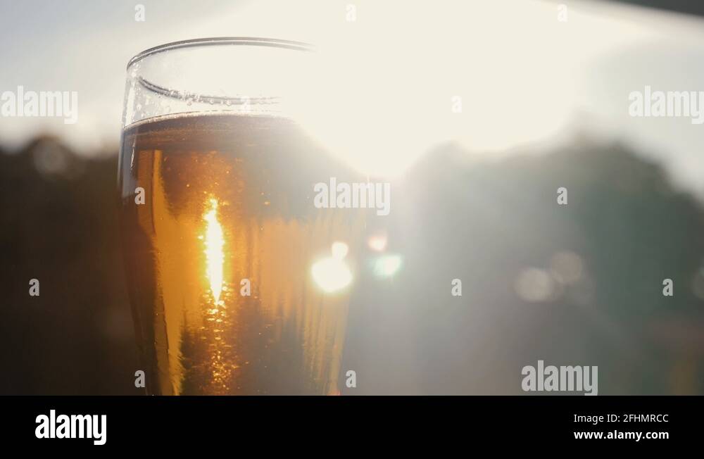 A beer in the sun Stock Videos & Footage - HD and 4K Video Clips - Alamy