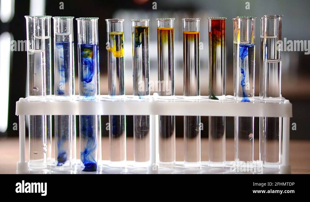 laboratory work on mixing reagents with colors of different colors ...
