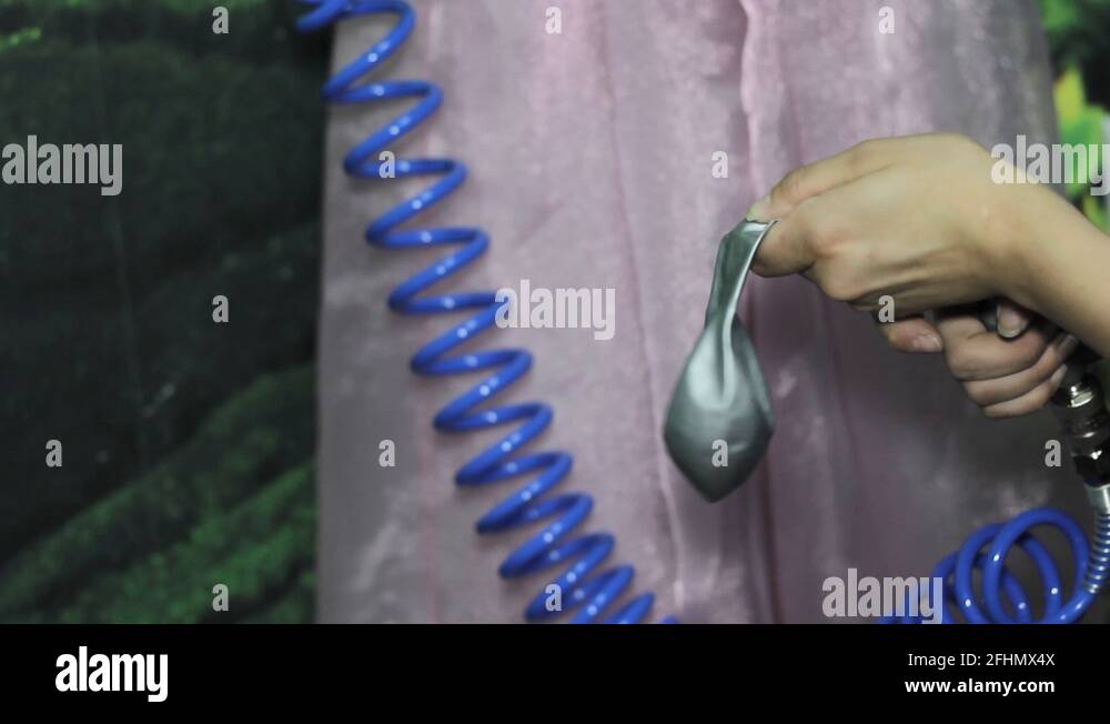 Working process of inflating a balloon with gas helium from a metal gas ...