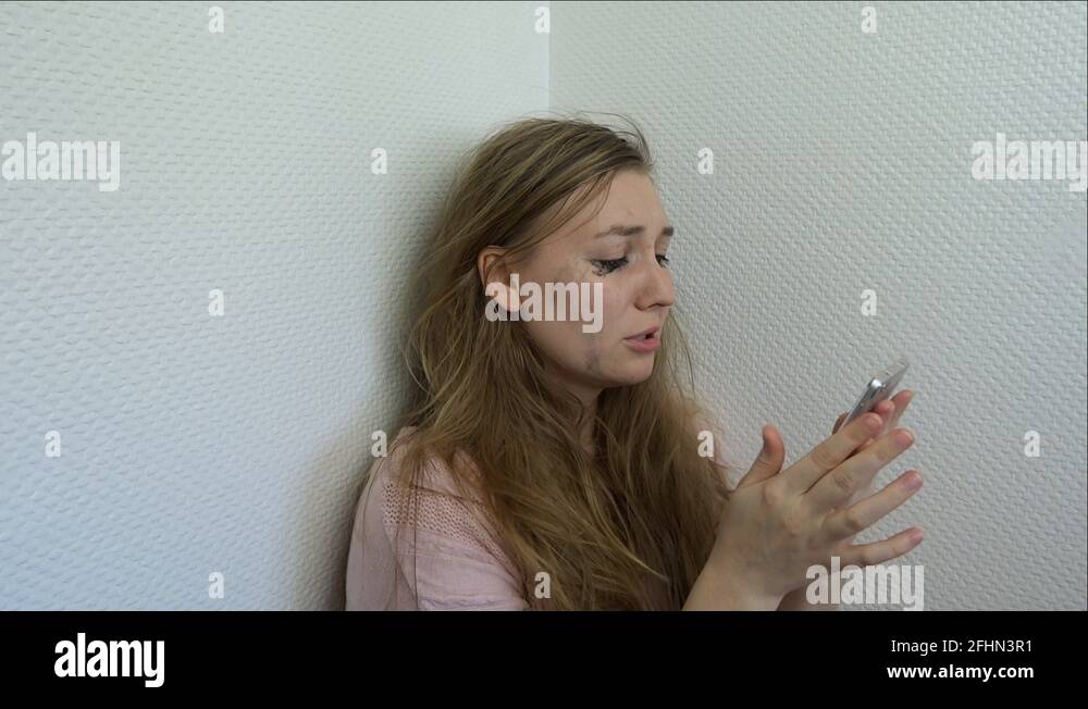 A Crying Girl Over A Sad Message A Breakup Stock Video Footage Alamy