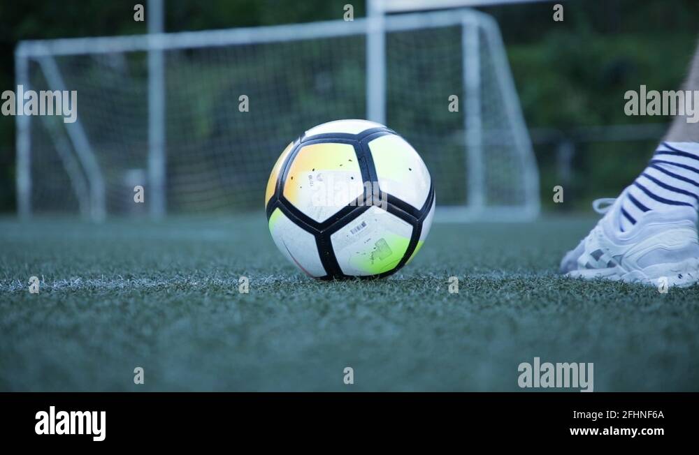 Football being kicked, slow motion Stock Video Footage - Alamy