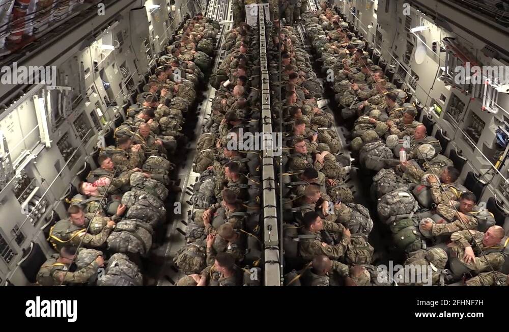 Army Soldiers settle and prepare for static line jump from C-17 ...
