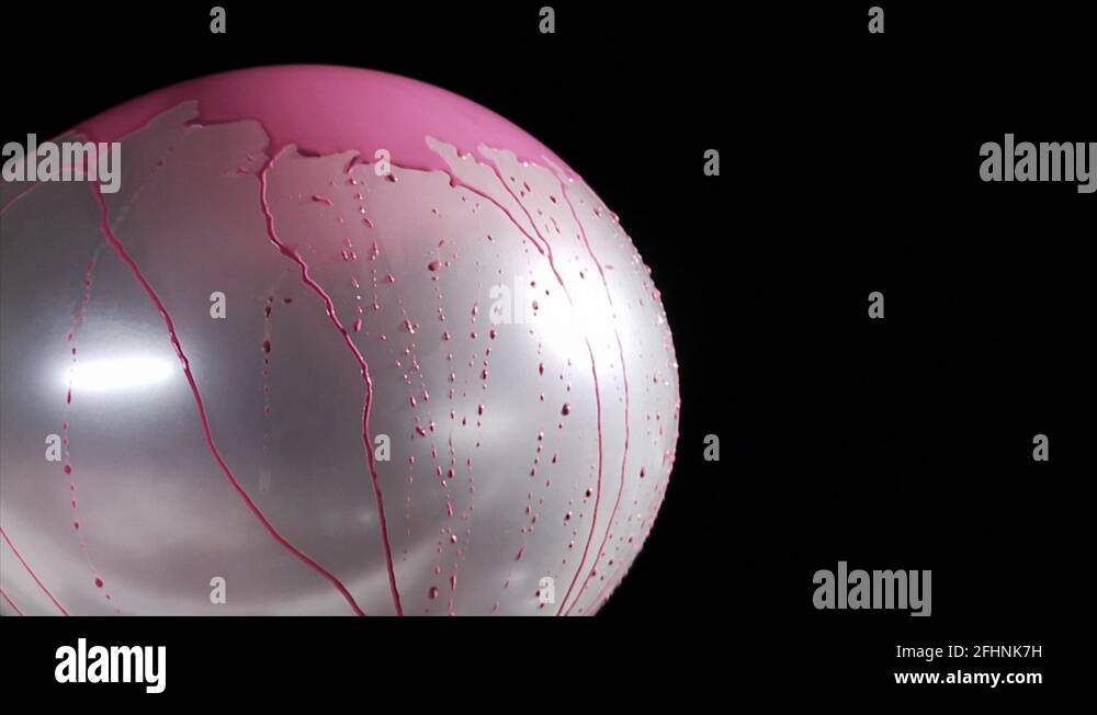 Pink Balloon with Paint Splash in Black Background Stock Video Footage ...