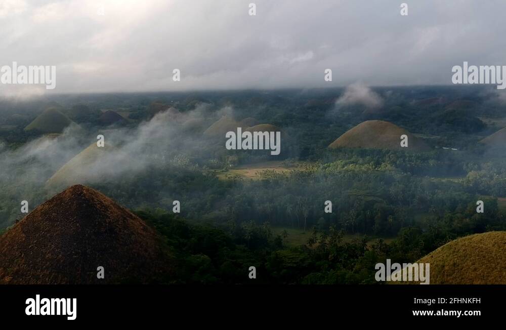 Droneshot of chocolate hills in the Philippines shot during daytime on a cloudy Stock Video ...