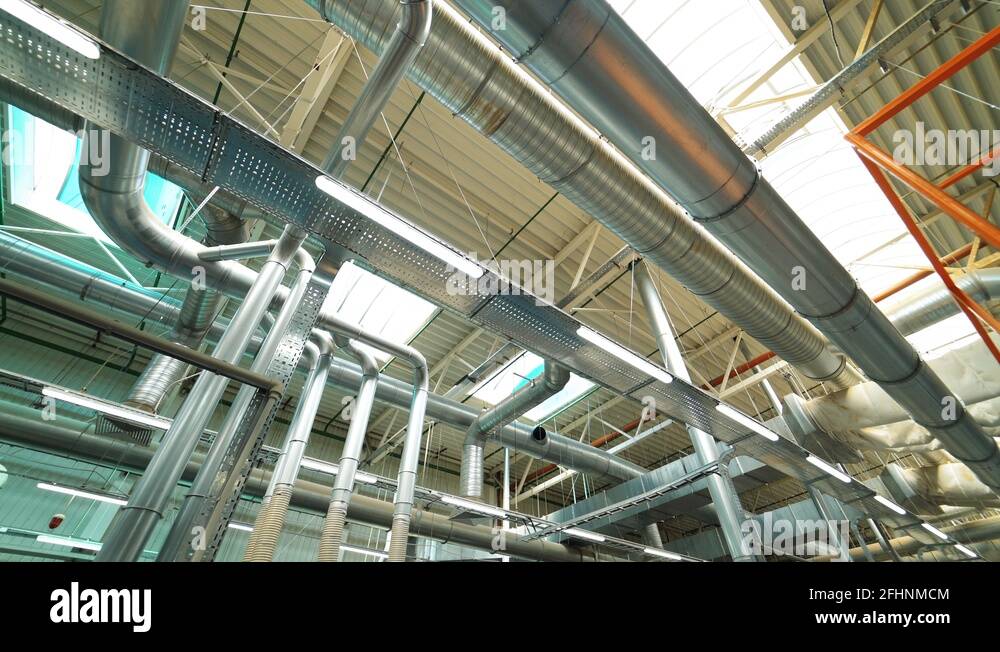 Industrial factory ceiling with ventilation system and lights ...