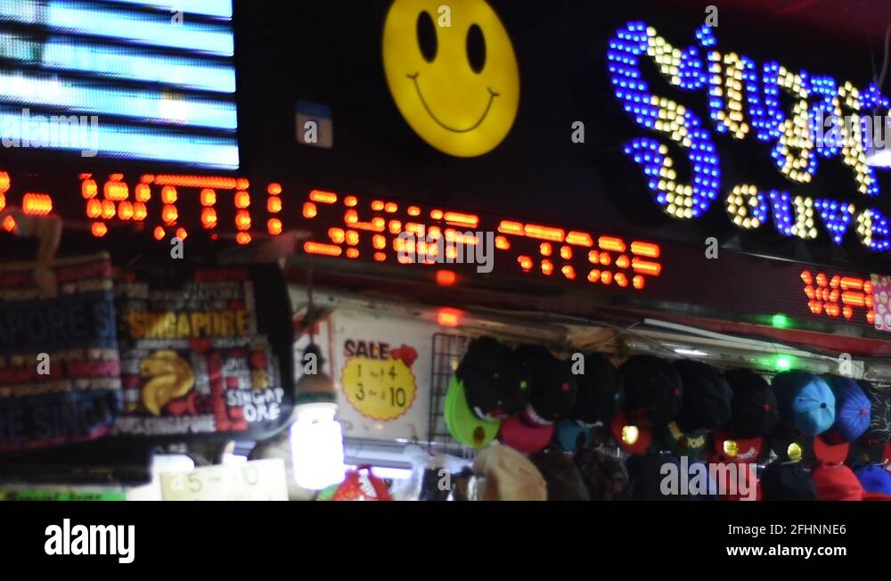 neon signs, Singapore night market Stock Video Footage - Alamy
