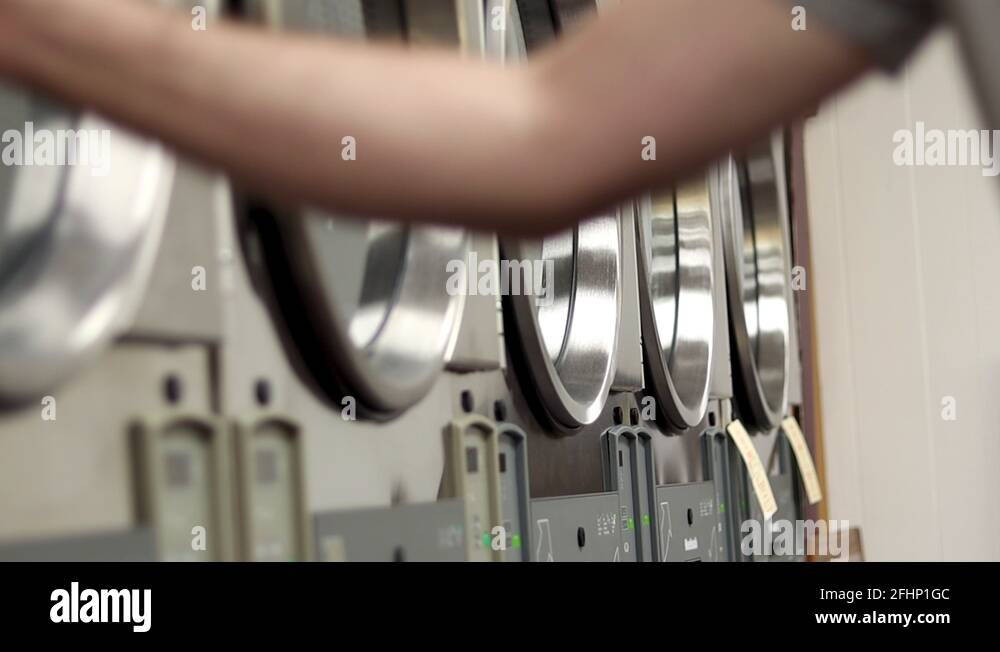 Man drying clothes Stock Videos & Footage - HD and 4K Video Clips - Alamy