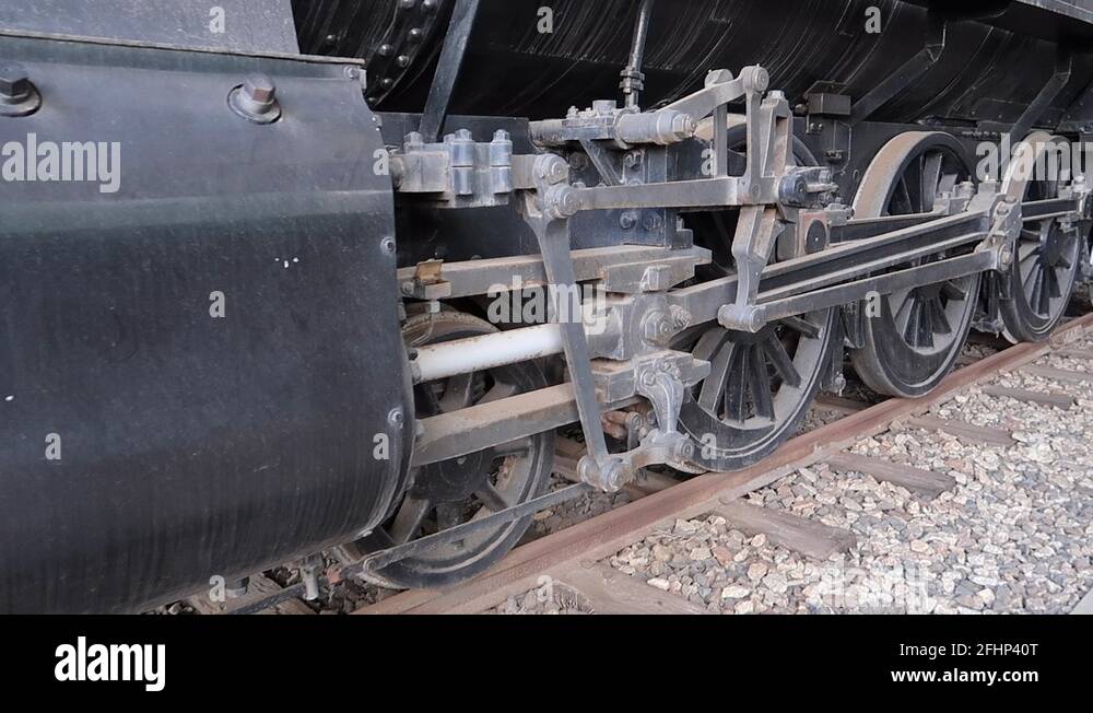 Vintage train engine linkage and wheels walkthrough Stock Video Footage ...