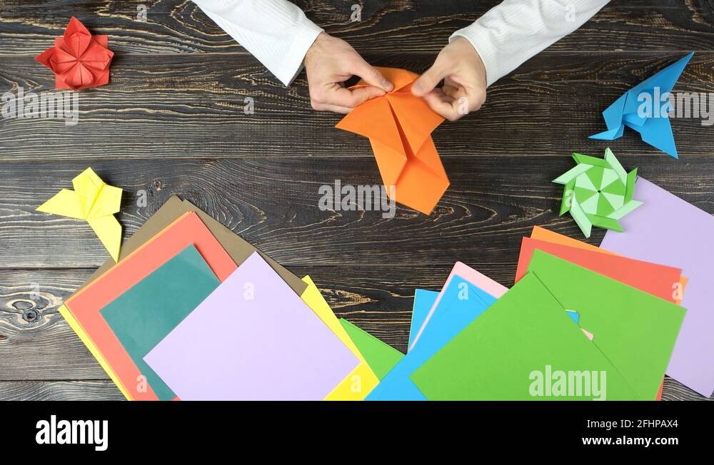 Hands folding origami Stock Videos & Footage - HD and 4K Video Clips ...