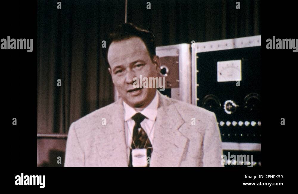 1960s: UNITED STATES: science presenter talks to camera about light ...