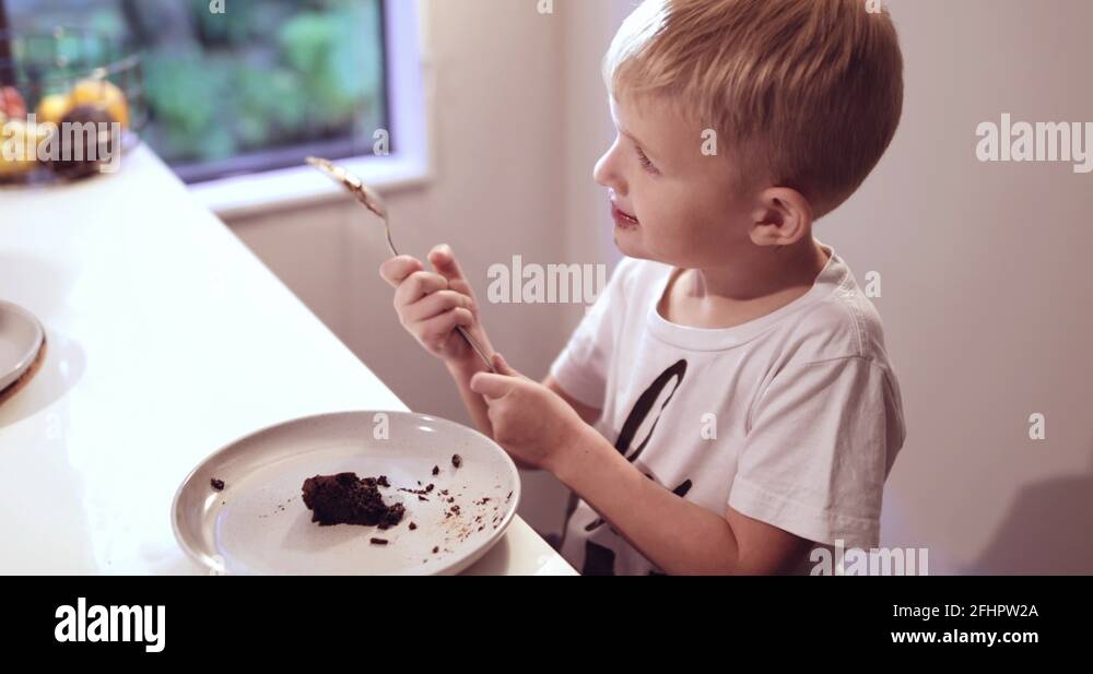 Young boy child eating chocolate cake Stock Videos & Footage - HD and ...