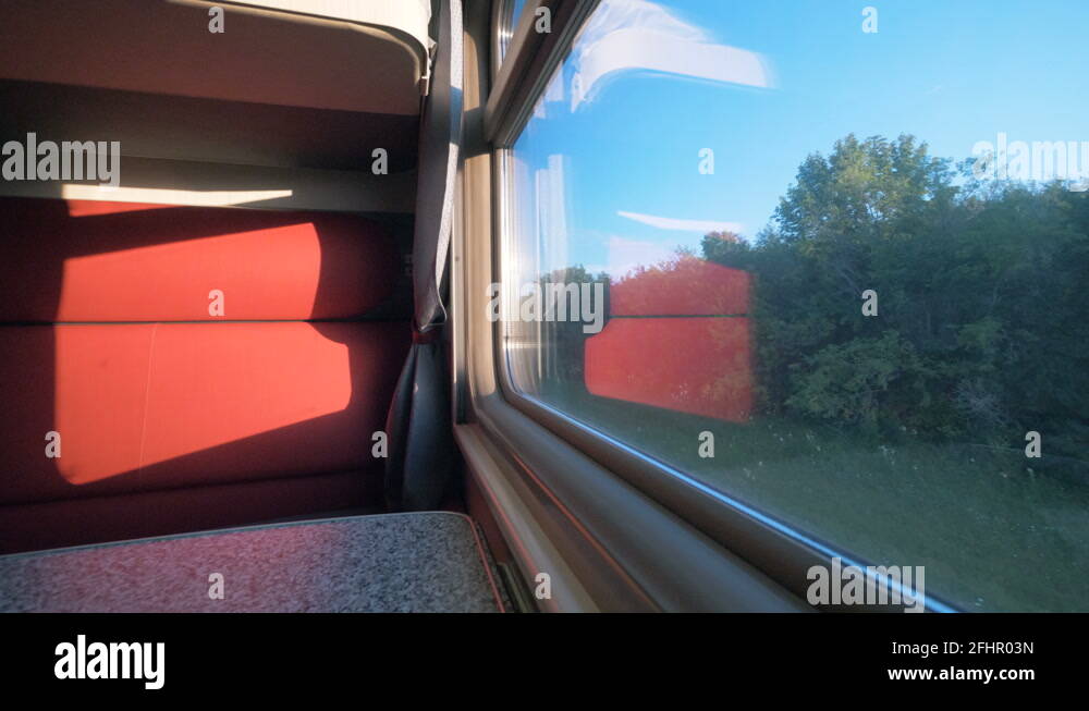 Travelling by train concept. Half of a train cabin with a window shown ...
