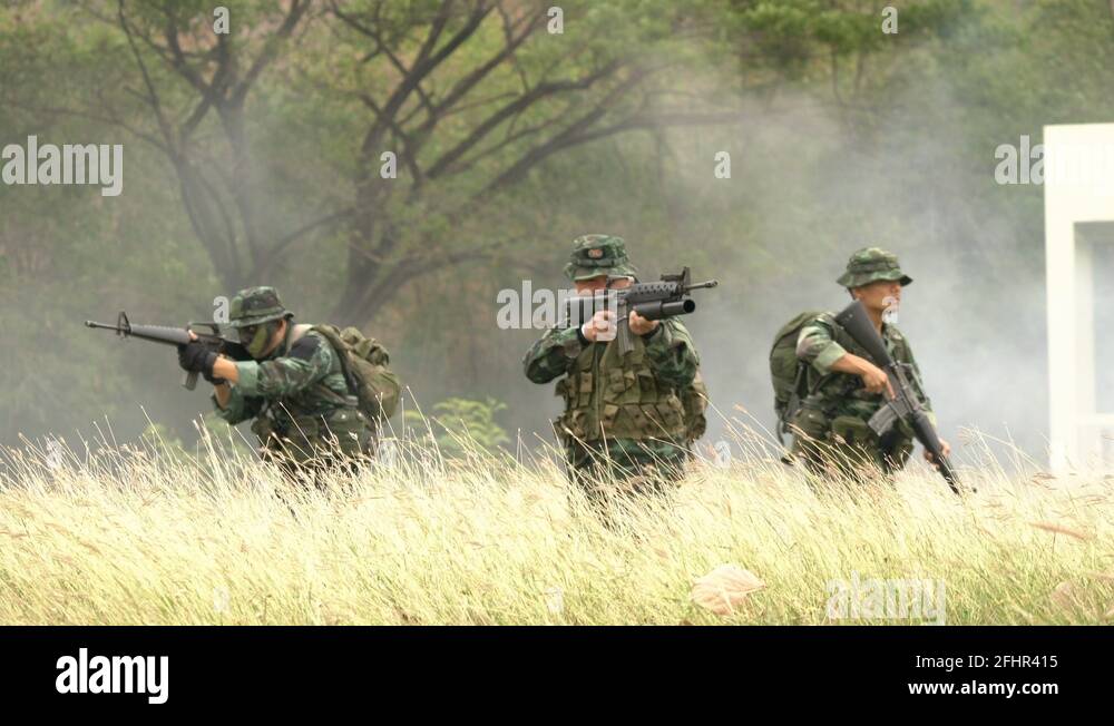 Military holding gun uniform Stock Videos & Footage - HD and 4K Video ...