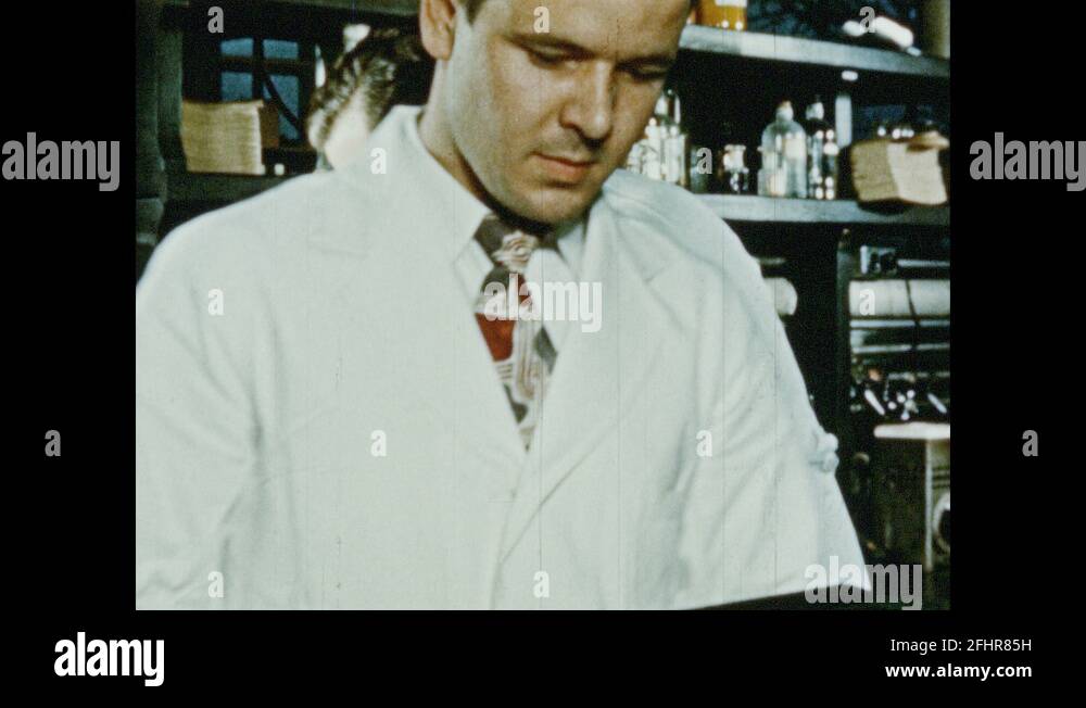 1950s: Scientists work in laboratory. Scientist works with chemistry ...