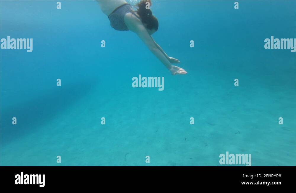 Girl diving Stock Videos & Footage - HD and 4K Video Clips - Alamy