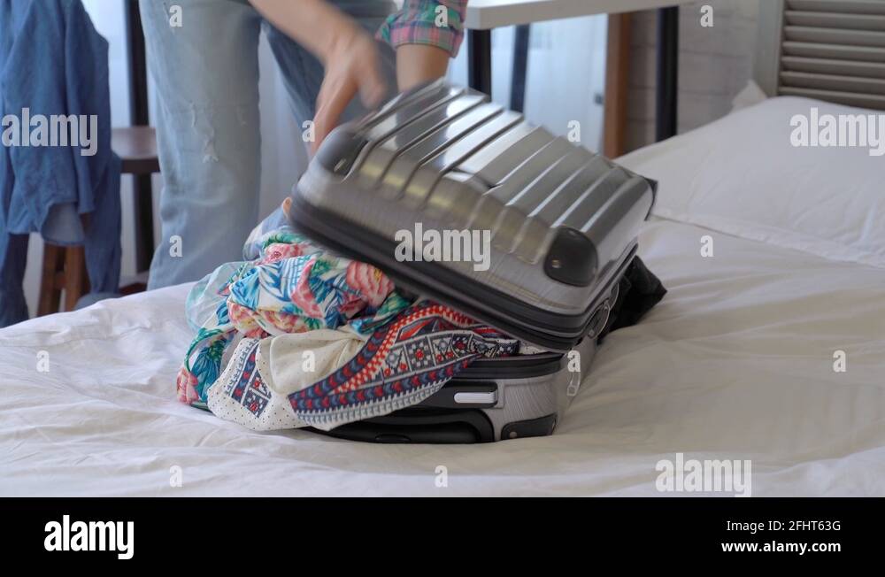 Woman squeezing into clothes Stock Videos & Footage - HD and 4K Video ...