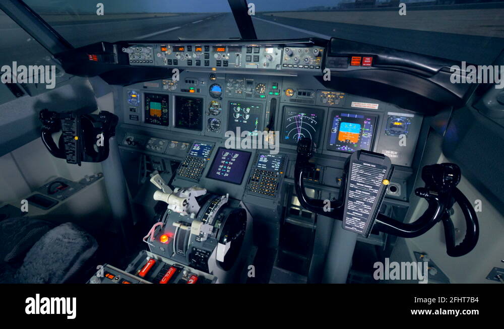 Interior of a functioning cockpit of an airplane. Empty cockpit of an ...