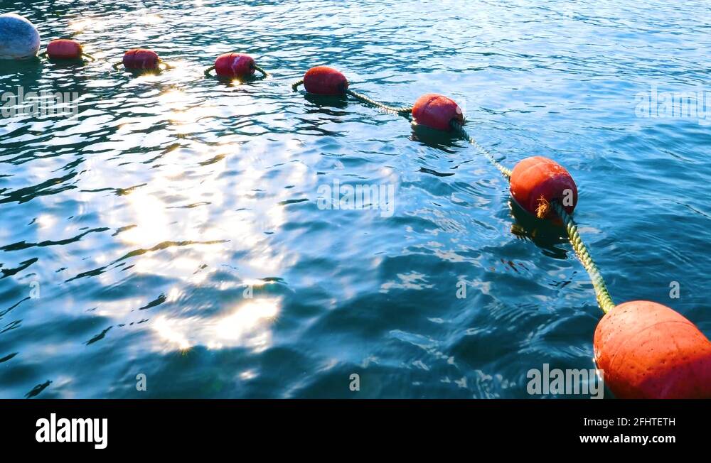 Line of buoys float Stock Videos & Footage - HD and 4K Video Clips - Alamy