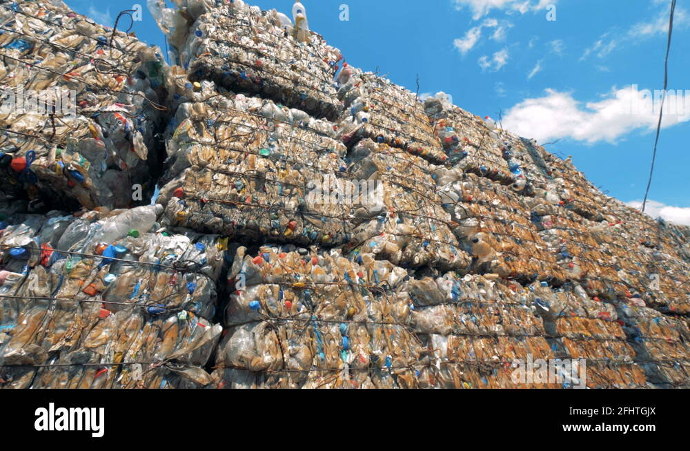 Plenty stacked trash blocks with plastic ready for further recycling ...