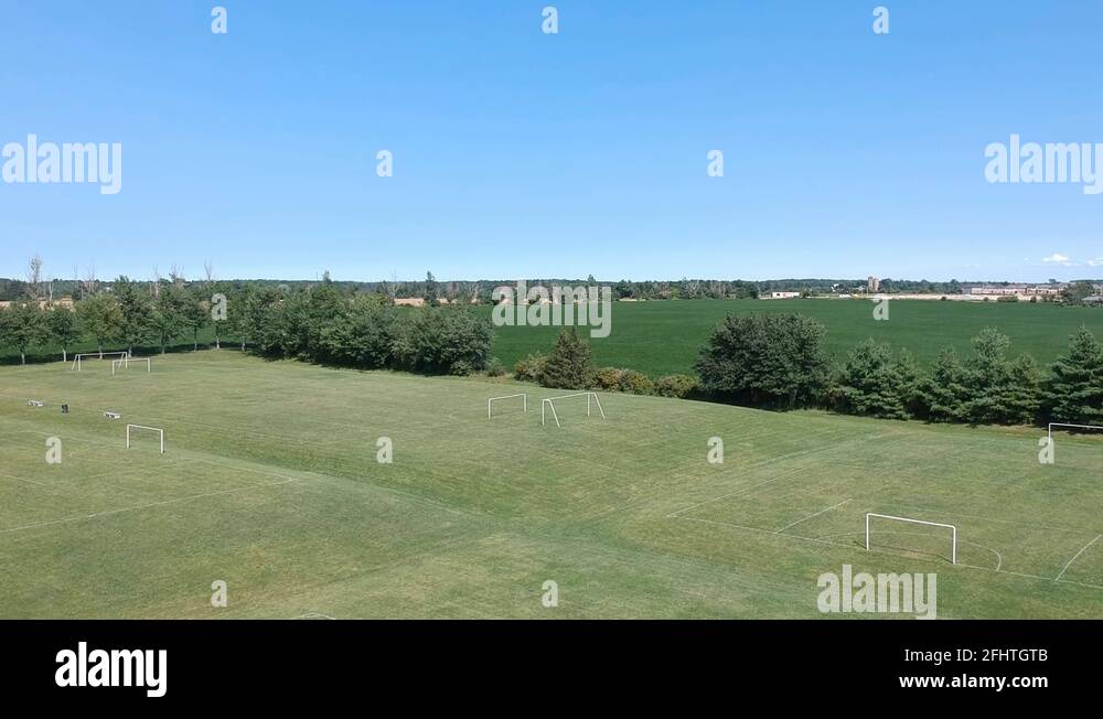 Drone footage of a soccer field or football pitch. Aerial shots from ...