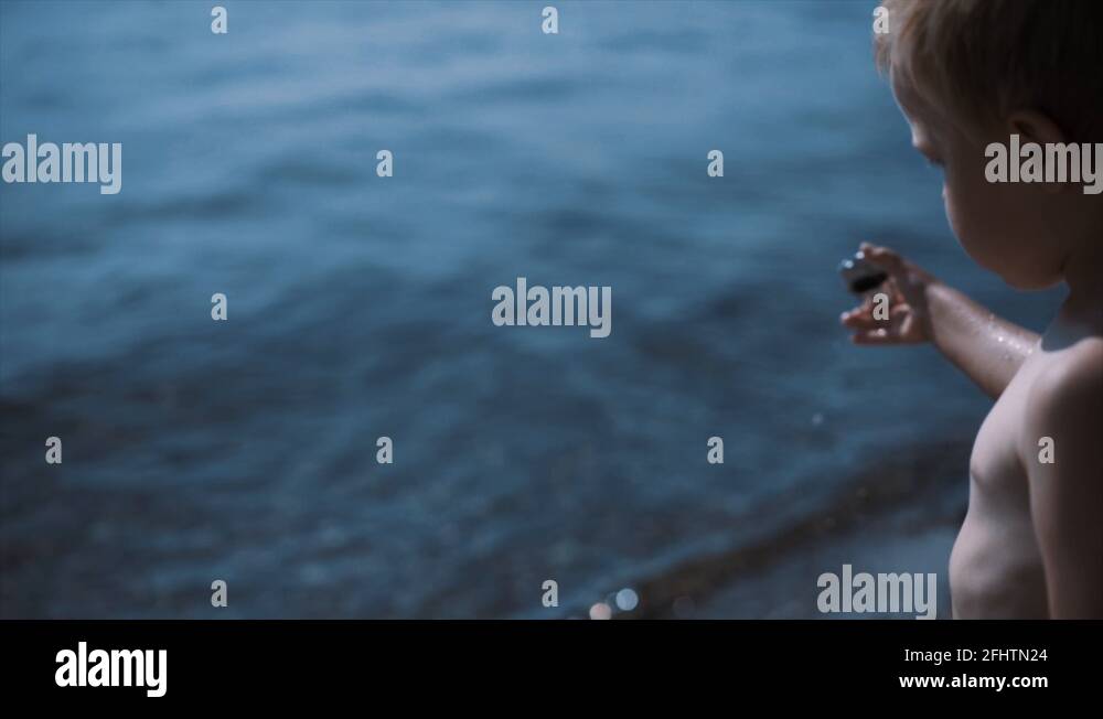 Throwing a rock Stock Videos & Footage - HD and 4K Video Clips - Alamy