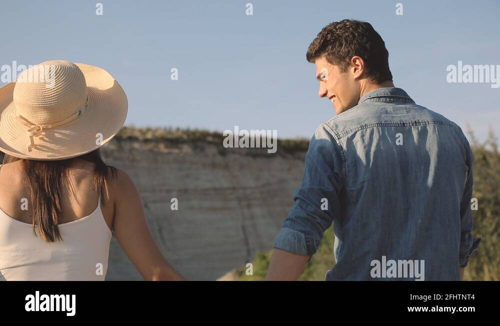 Two people walking together two people walking in the countryside Stock ...