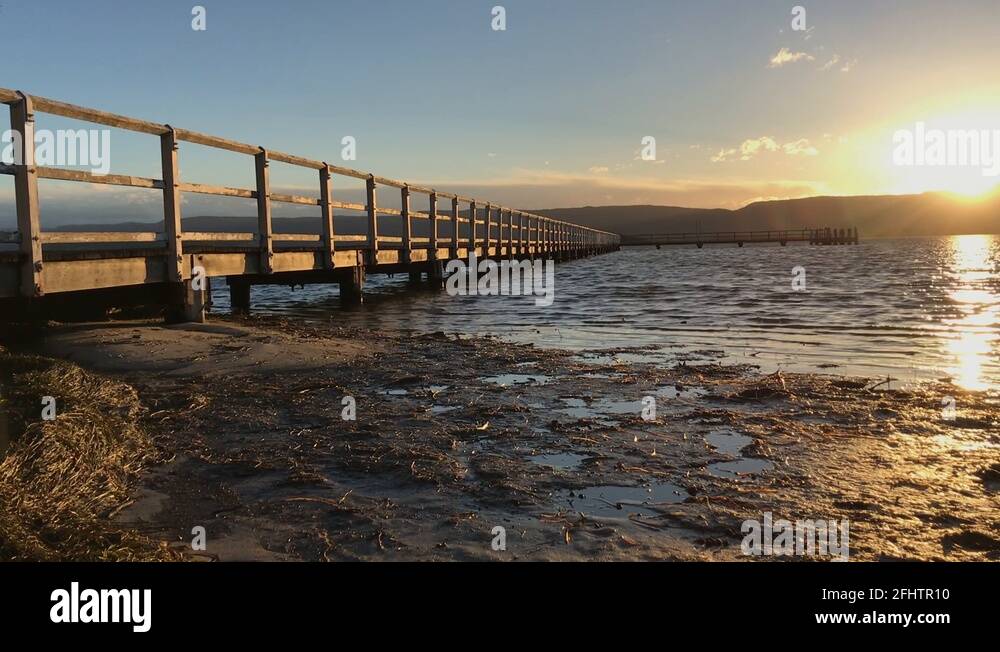 Water jetty sunset Stock Videos & Footage - HD and 4K Video Clips - Alamy