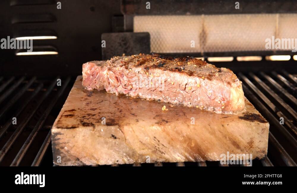 Steak on hot rock Stock Videos & Footage - HD and 4K Video Clips - Alamy