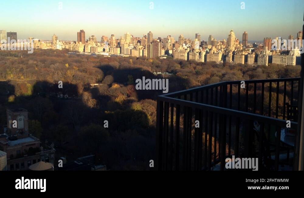 Shadows grow long across Central Park and uptown buildings during dusk ...