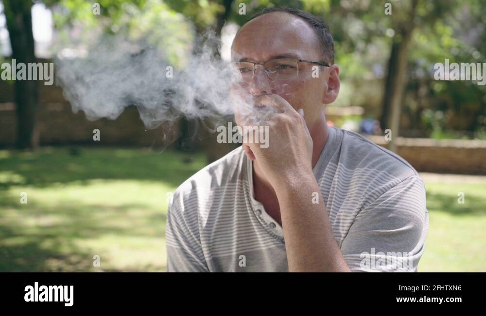 Smoking park bench Stock Videos & Footage - HD and 4K Video Clips - Alamy