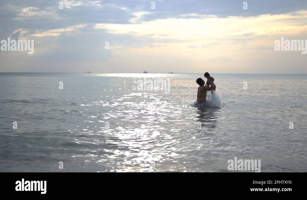 Father and son playing in the ocean Stock Videos & Footage - HD and 4K ...