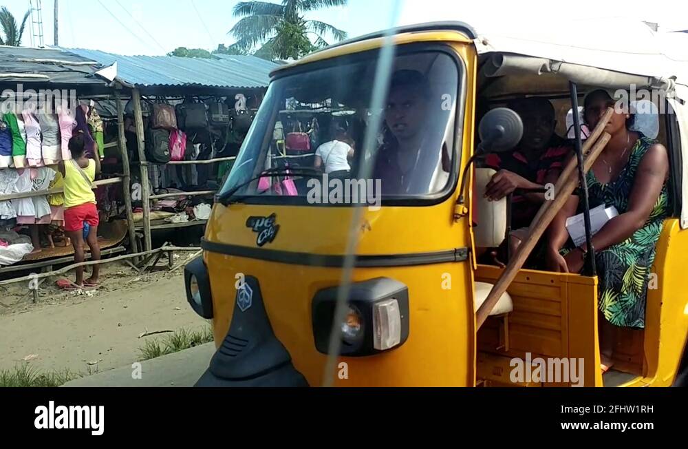 Yellow auto rickshaw with passengers Stock Videos & Footage - HD and 4K ...