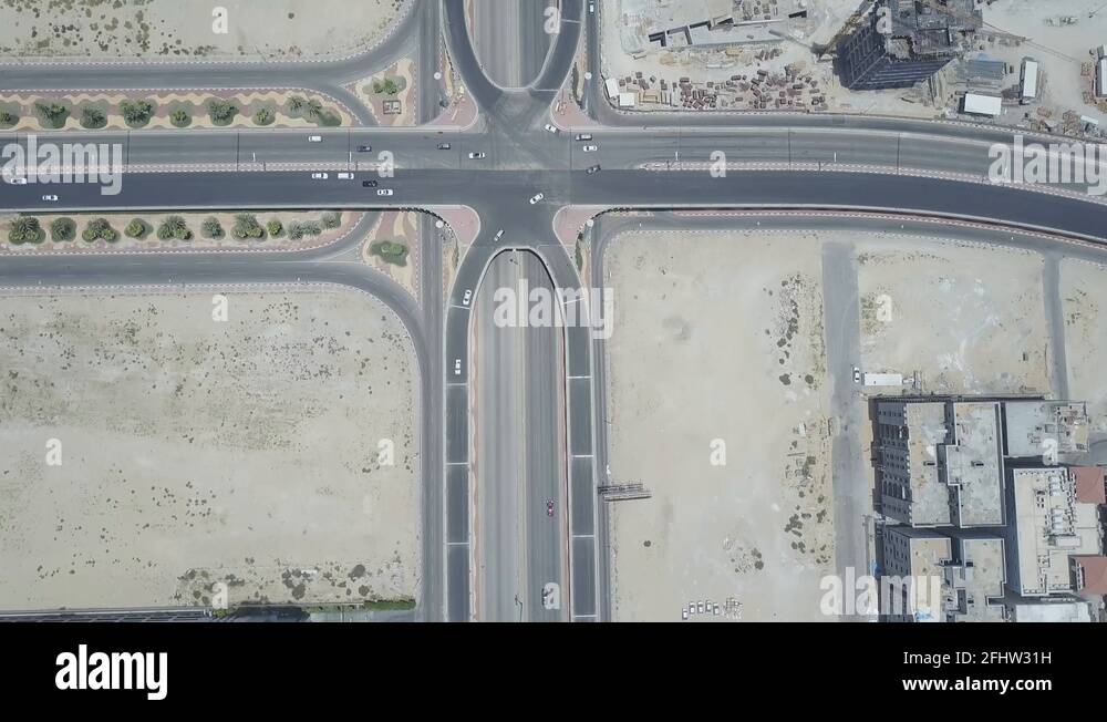 Aerial top down view of cars on a bridge and highway in Khobar. 4K ...
