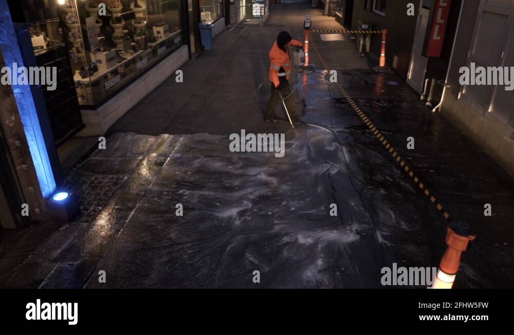 Woman washing street Stock Videos & Footage - HD and 4K Video Clips - Alamy