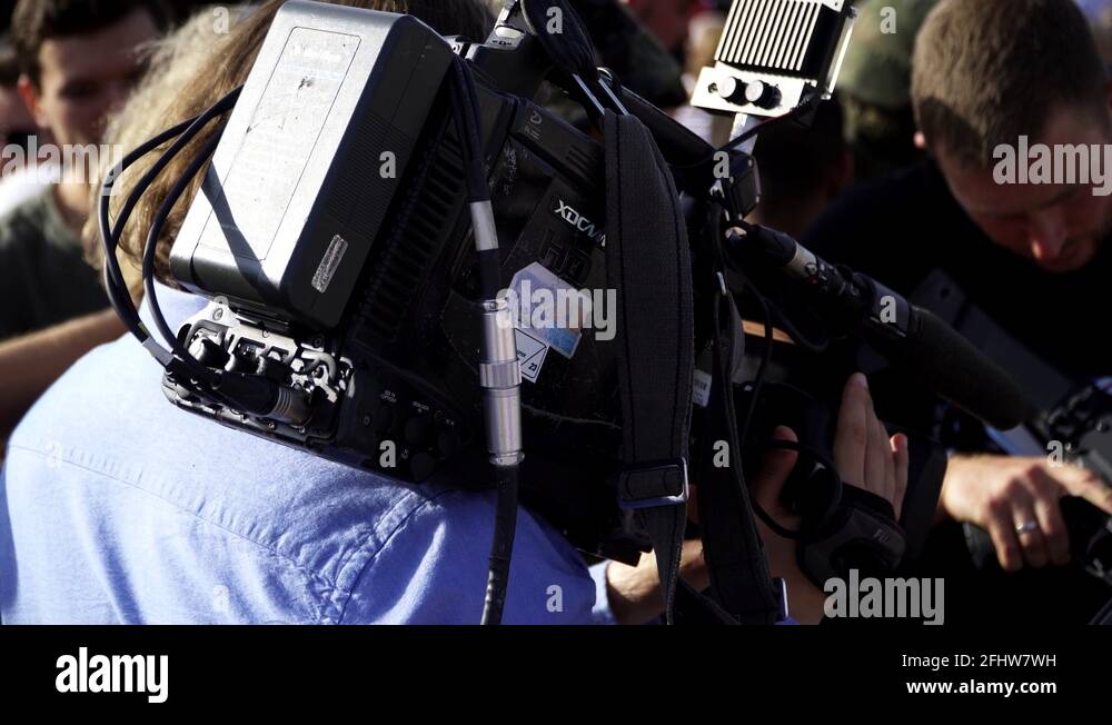 Cameraman filming a tv reporter Stock Videos & Footage - HD and 4K ...